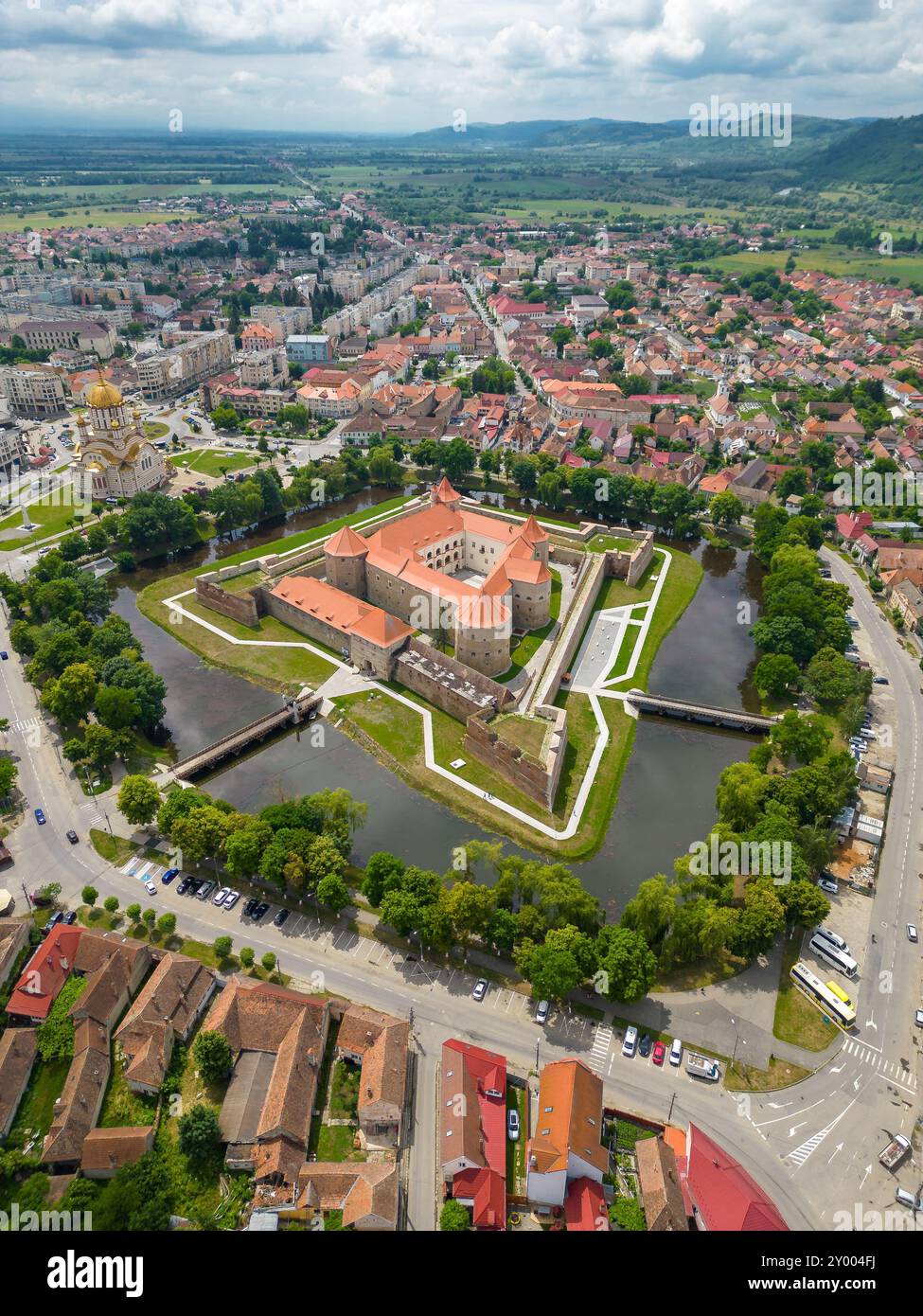 Fagaras City, Romania aerial drone perspective. In the middle is ...