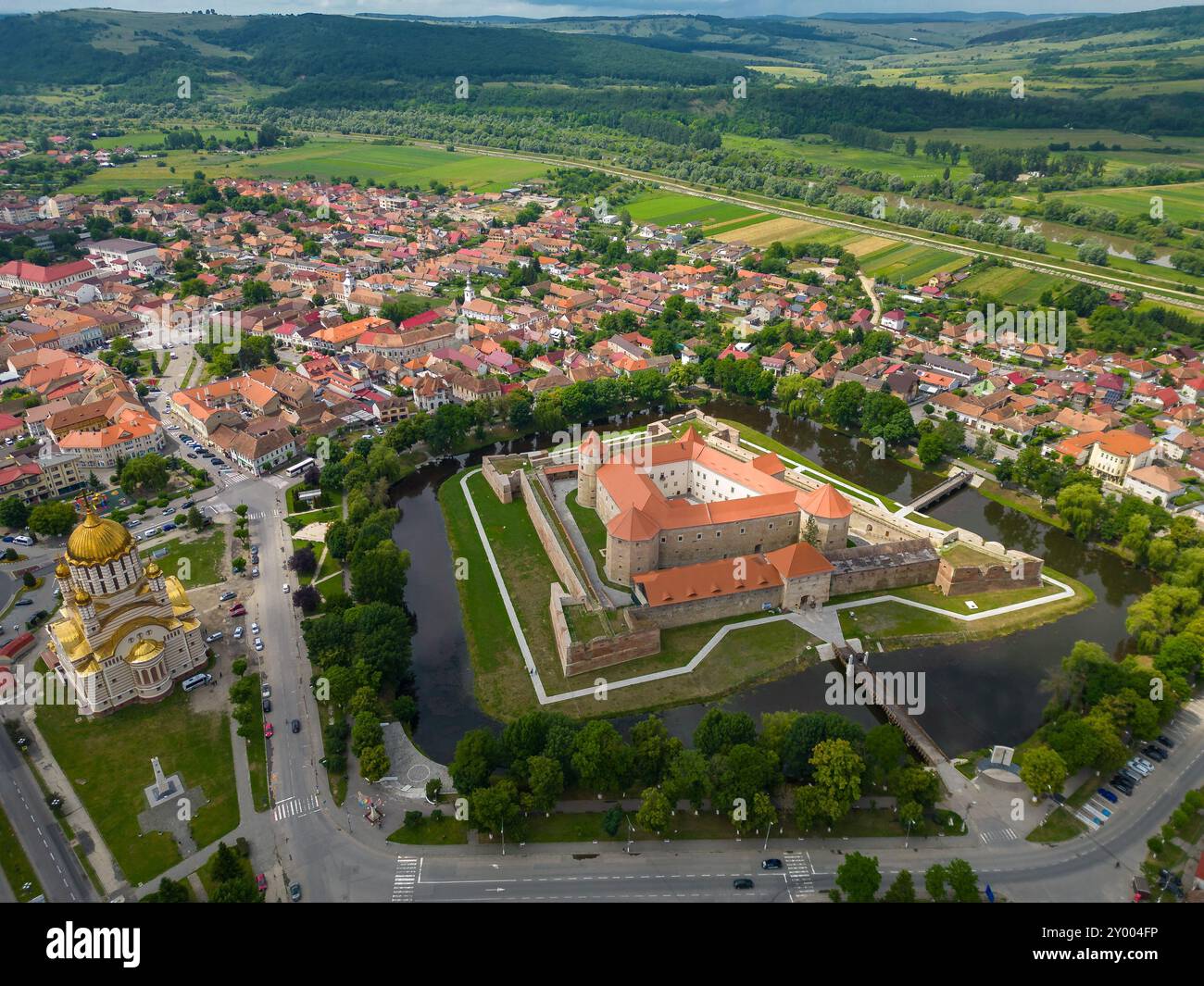 Fagaras City, Romania aerial drone perspective. In the middle is ...