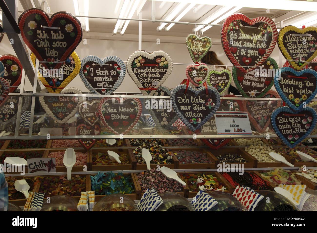 Fairground stall with sweets and gingerbread hearts Stock Photo - Alamy