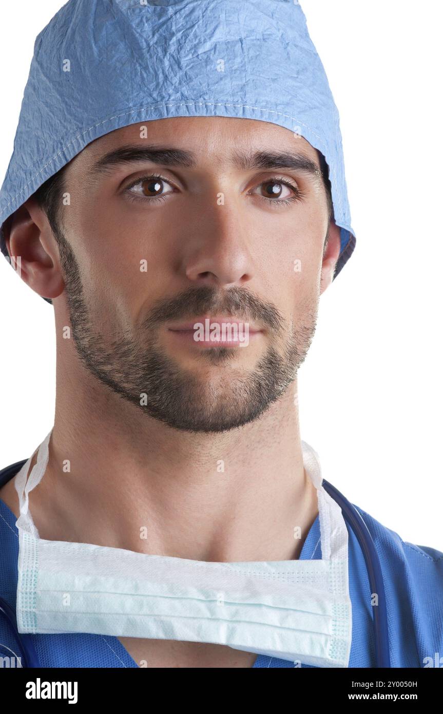 Surgeon during a surgery in an operation room isolated in white Stock ...