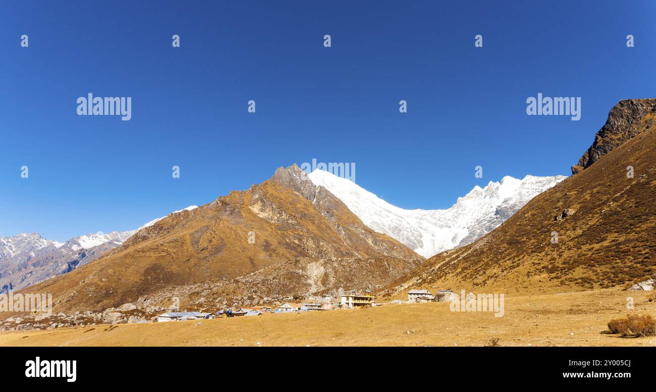Panoramic view of snow-capped Langtang Lirung Himalayan mountain range ...