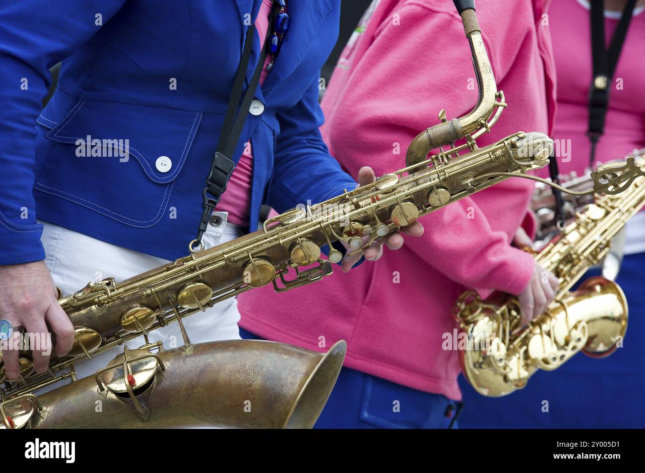Saxophone players in a band. performing saxophone Stock Photo - Alamy