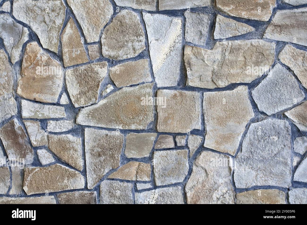 Solid stone wall background Stock Photo - Alamy