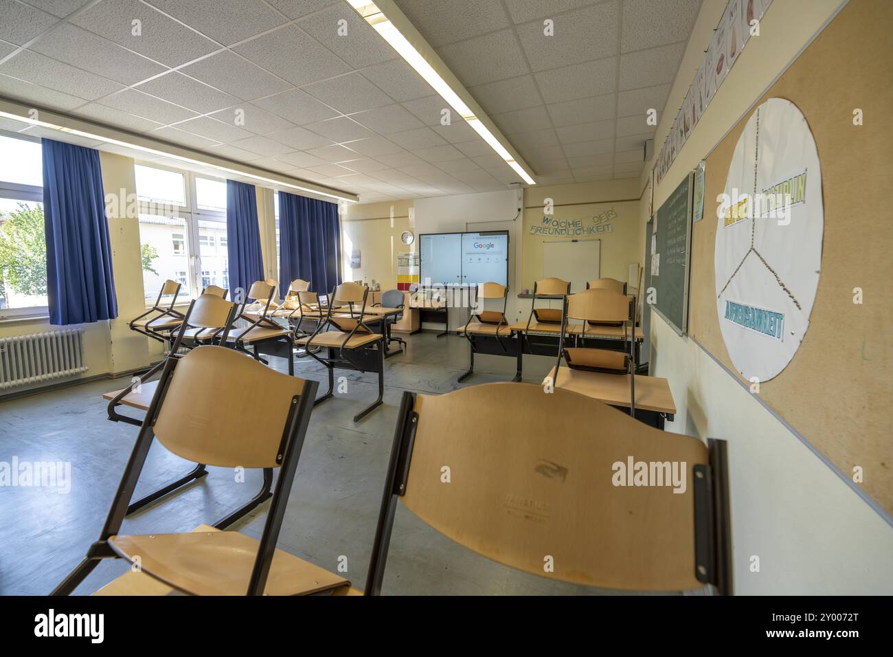 Classroom of a fourth grade, after school, the building is older but in ...