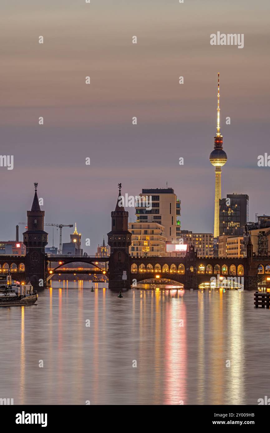 Berlin with the river Spree at twilight with the Oberbaum Bridge and ...