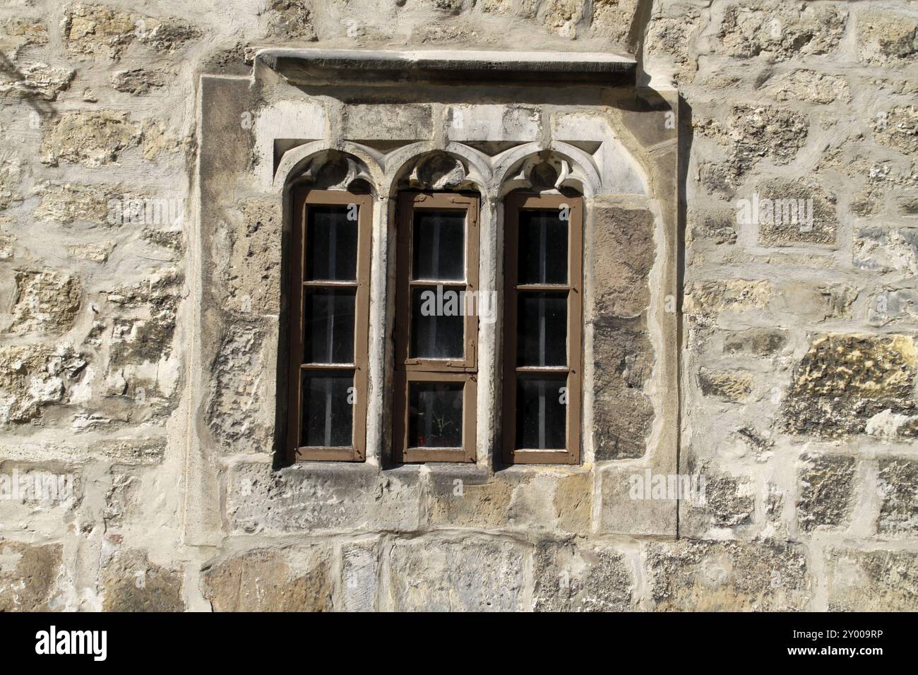 Three narrow windows Stock Photo - Alamy