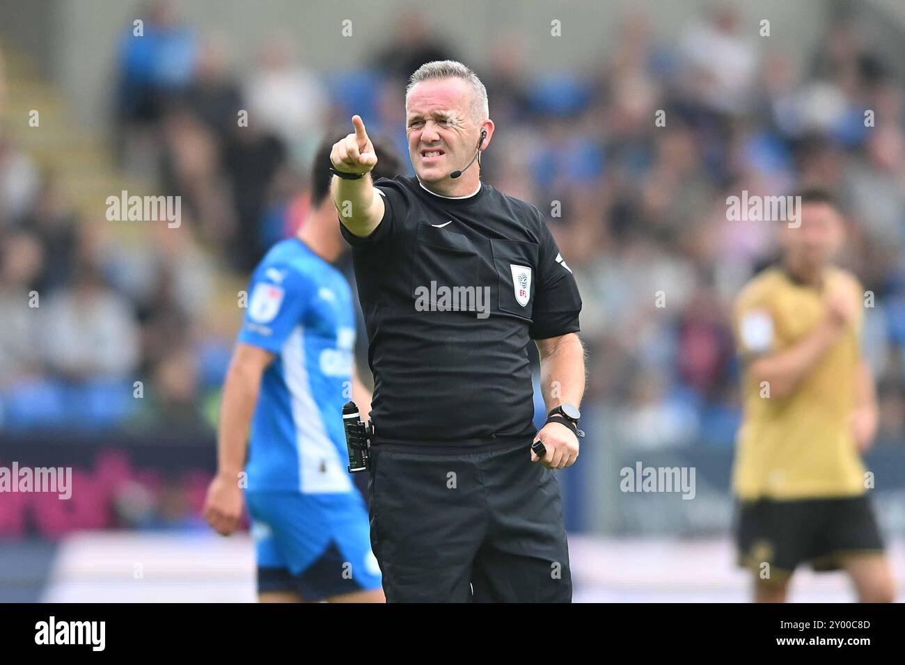 Peterborough, 31st Aug 2024. Referee Carl Brook (Match referee) points ...