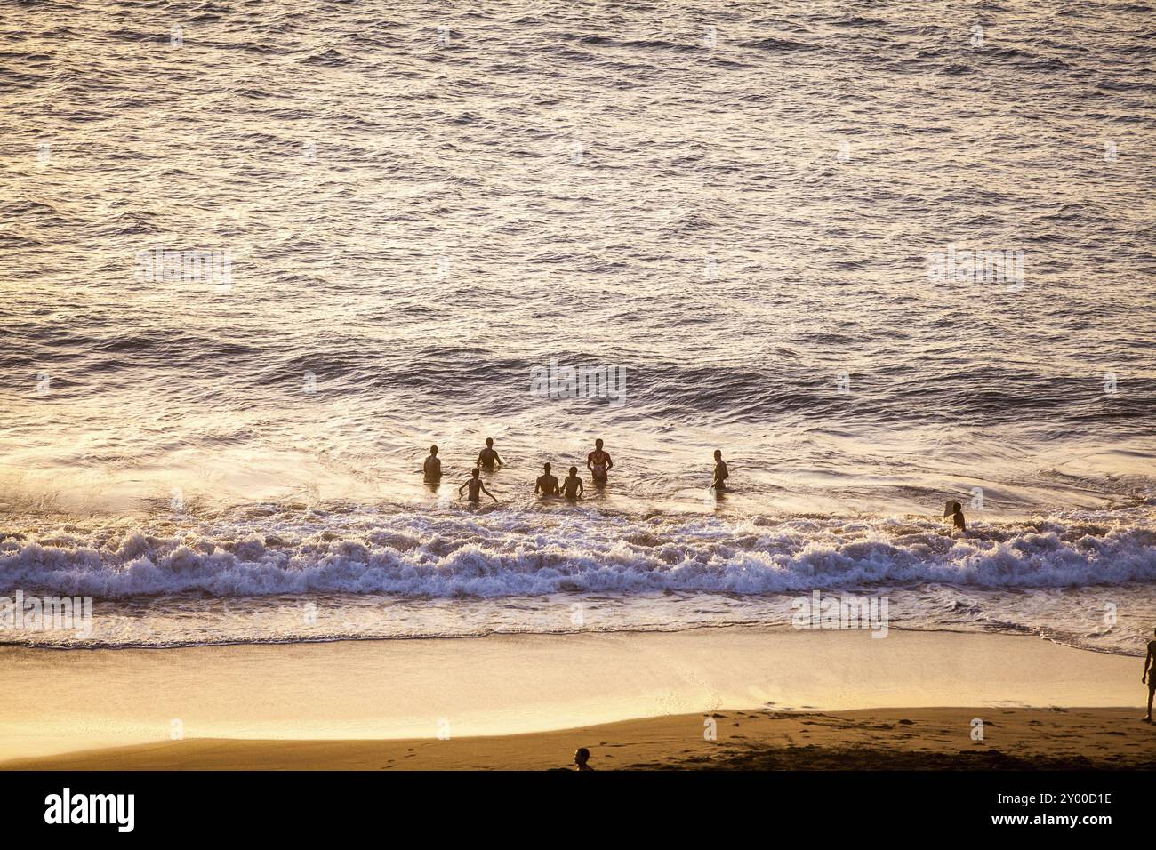 Group of guys on beach hi-res stock photography and images - Alamy