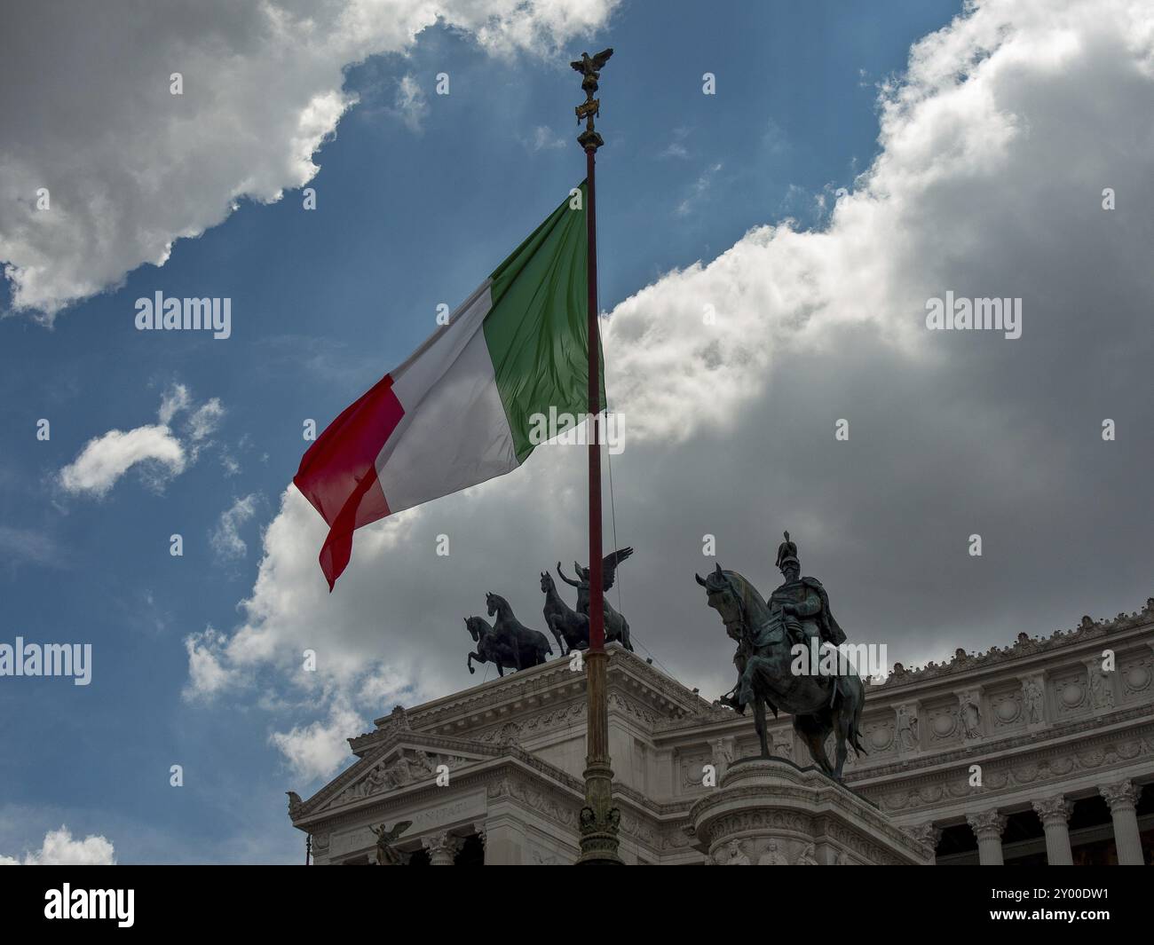 Italian national flag above a monumental building with equestrian ...