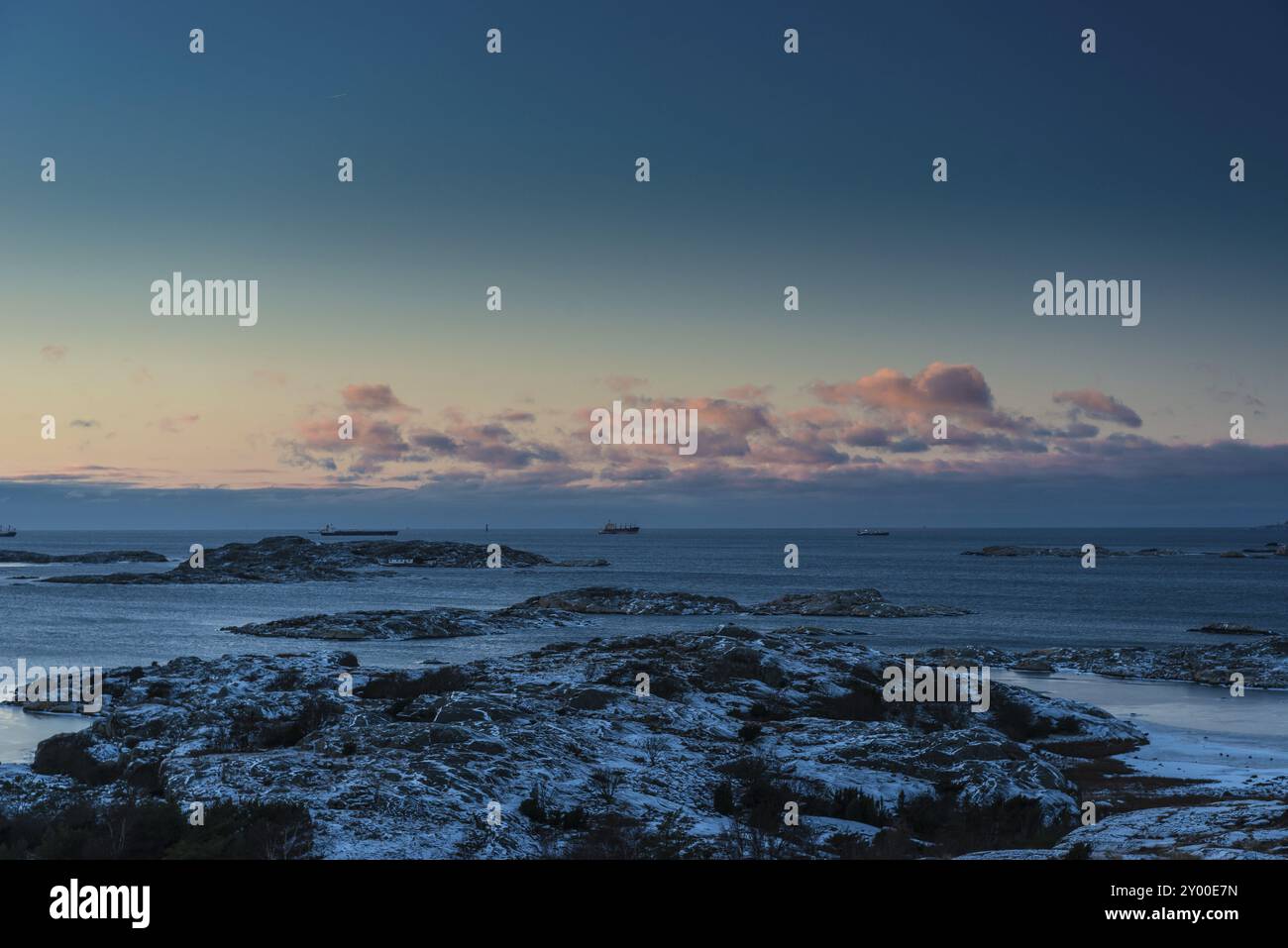 Snowy archipelago in the winter. Ships in the horizon Stock Photo - Alamy