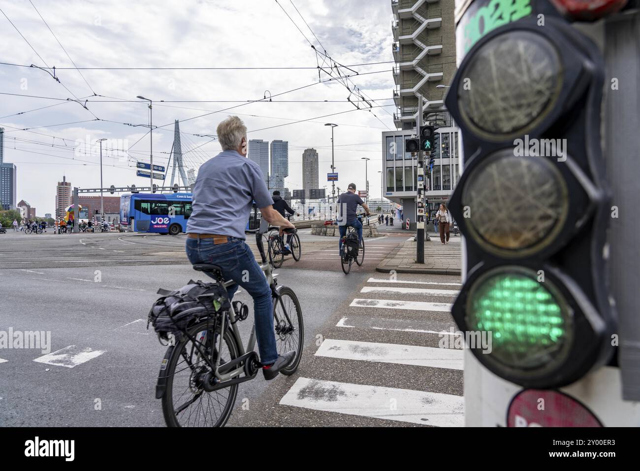 Bicycle traffic light, cyclist on cycle path, in front of the Erasmus ...