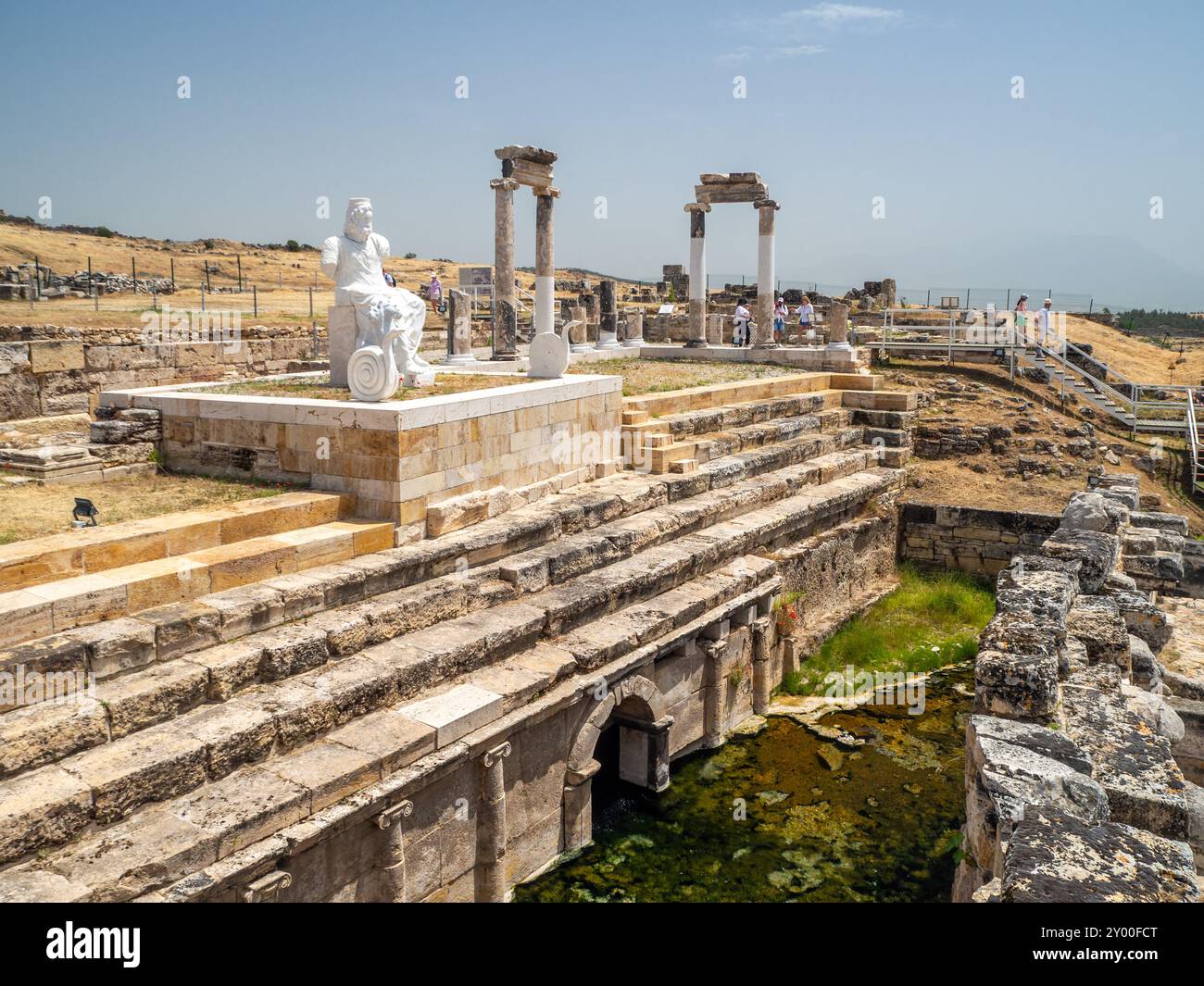 Pamukkale travertine terraces and the ancient Greek city of Hierapolis ...