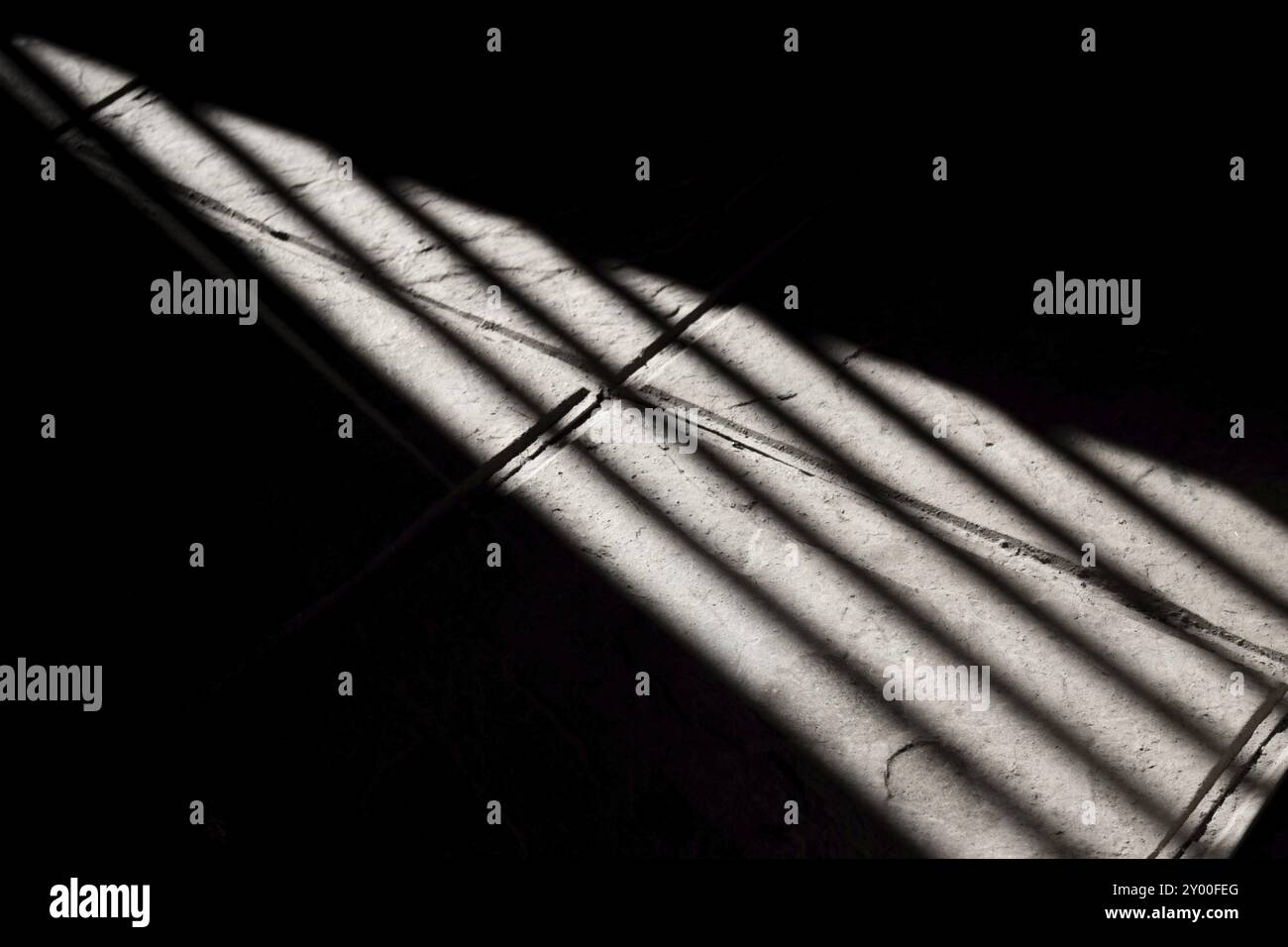 Sunlight reflection on tiled floor. Reflection of sunlight through a ...