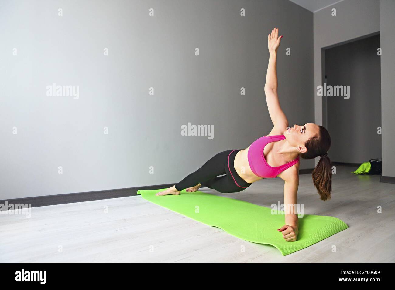 Woman doing exercises on floor hi-res stock photography and images - Alamy