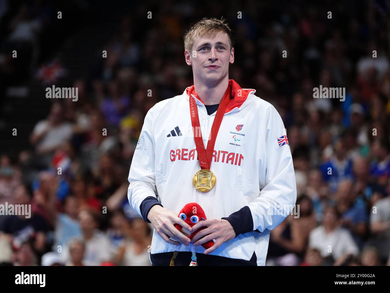 Great Britain's Stephen Clegg on the podium with the gold medal after ...