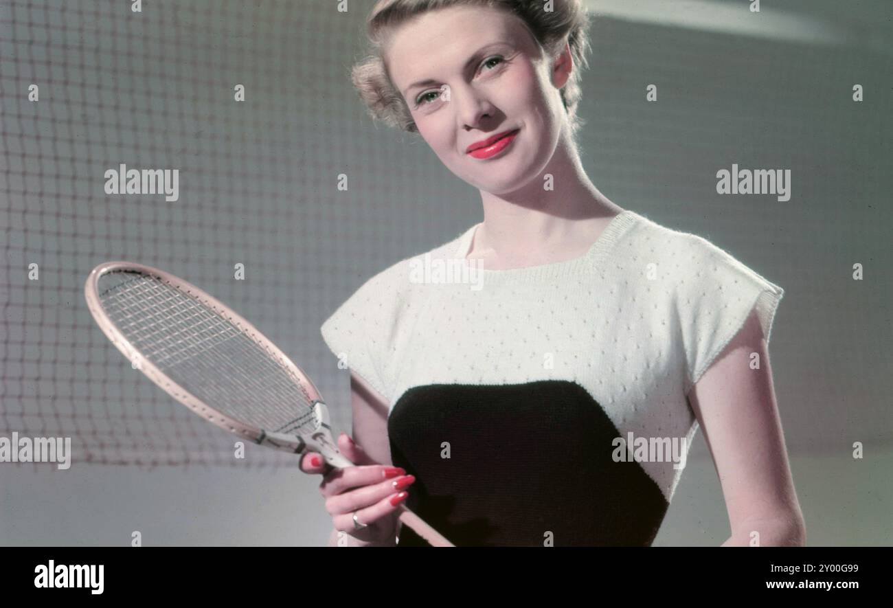 1950s, historical, an attractive lady modeling the latest woollen ...