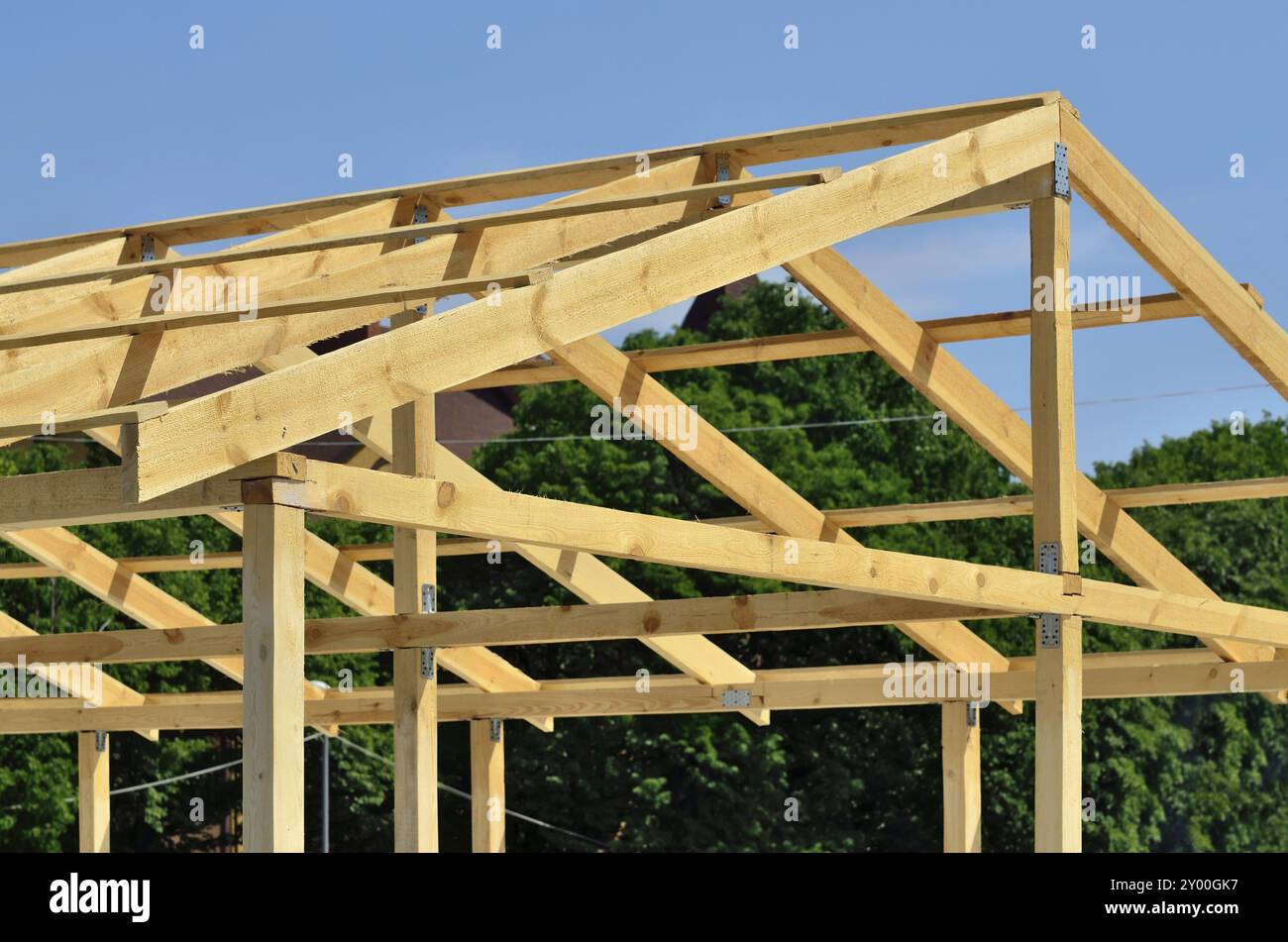 Construction of wooden trusses of thick boards Stock Photo - Alamy