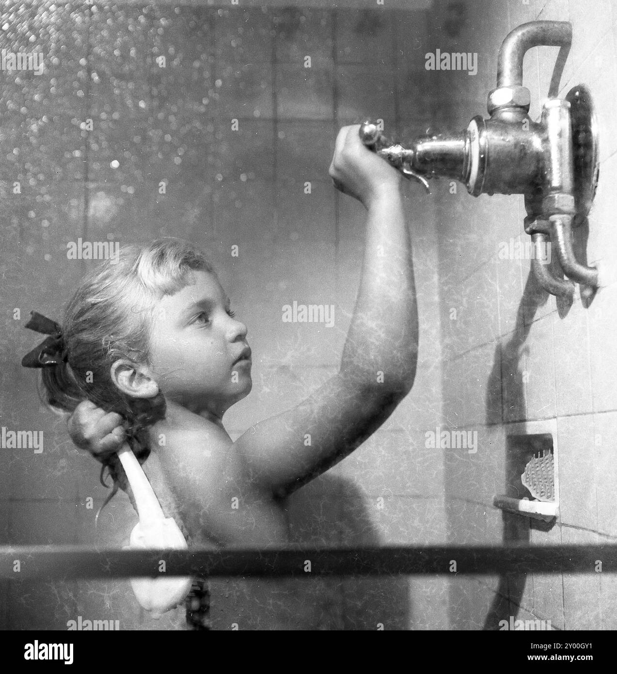 1991, historical, young girl having a power shower Stock Photo - Alamy