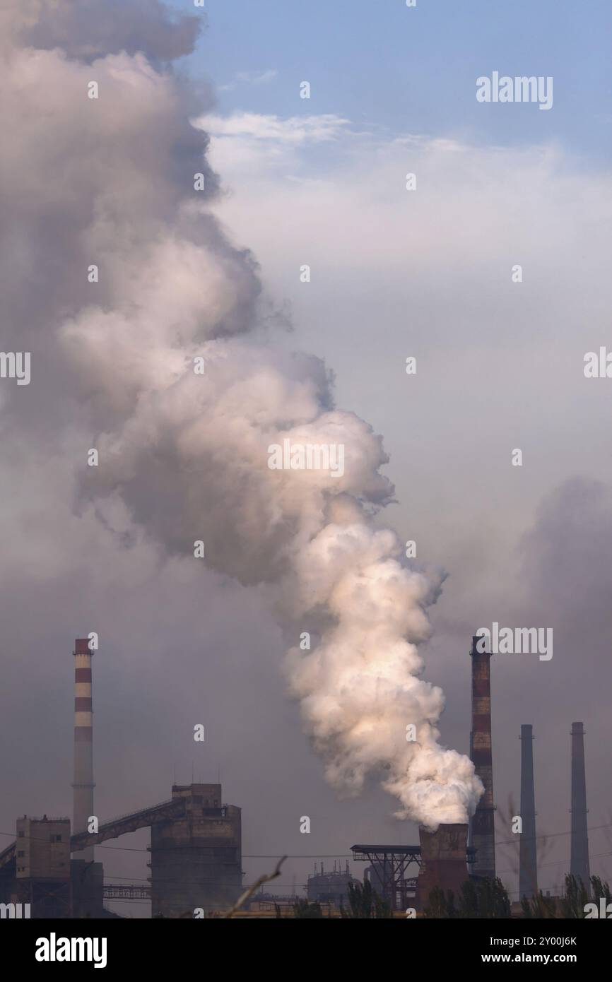 Plant with smoke. Air pollution Stock Photo - Alamy