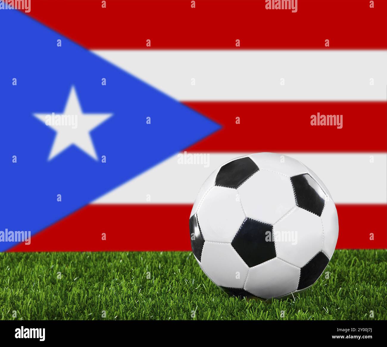 The Puerto Rico flag and soccer ball on the green grass Stock Photo - Alamy