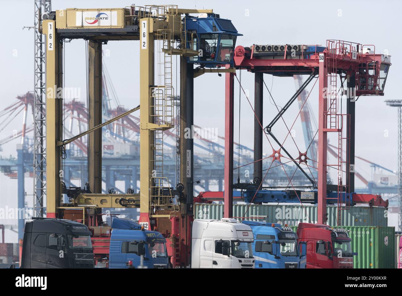 Trucks loaded with containers by Vancarrier. Trucks loaded with ...