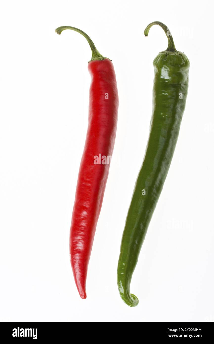 Red and green hot chilli peppers on white background Stock Photo - Alamy