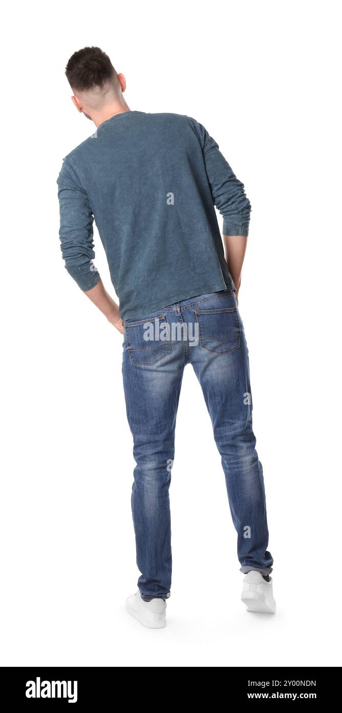 Man standing in queue on white background, back view Stock Photo - Alamy