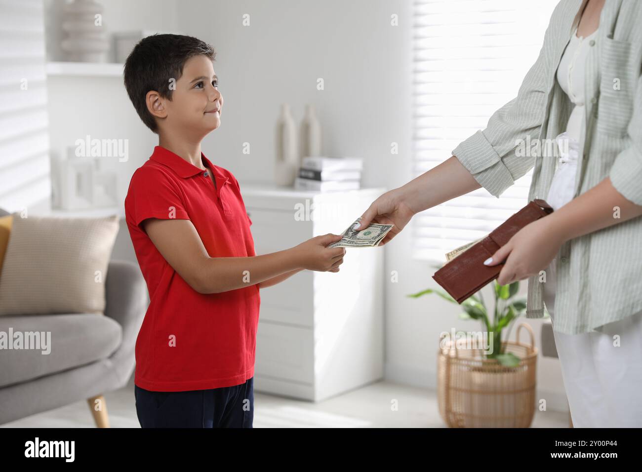 Child spending pocket money hi-res stock photography and images - Alamy