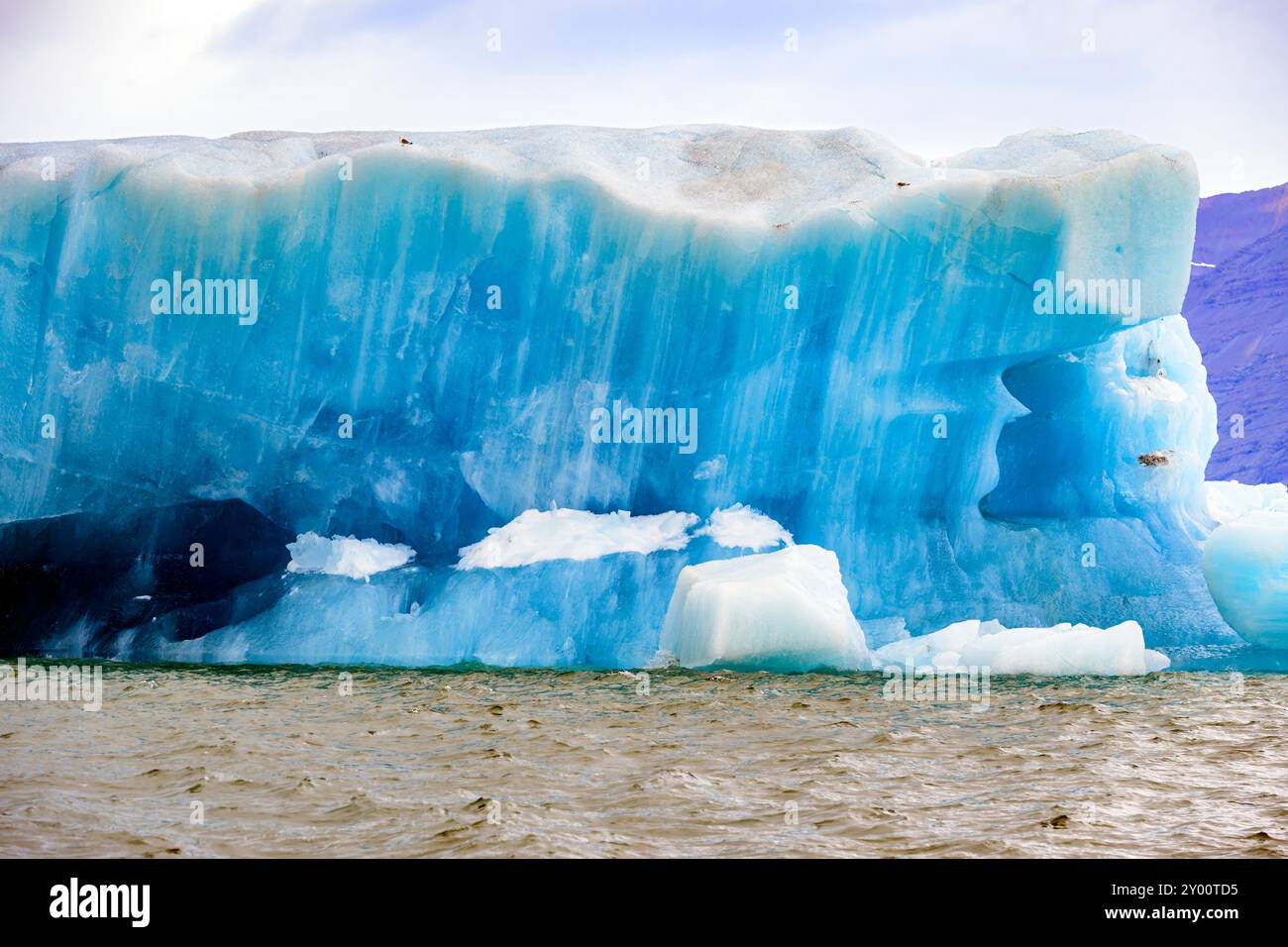 Blue iceberg at Jökulsárlón glacial lake, southern Iceland in early ...
