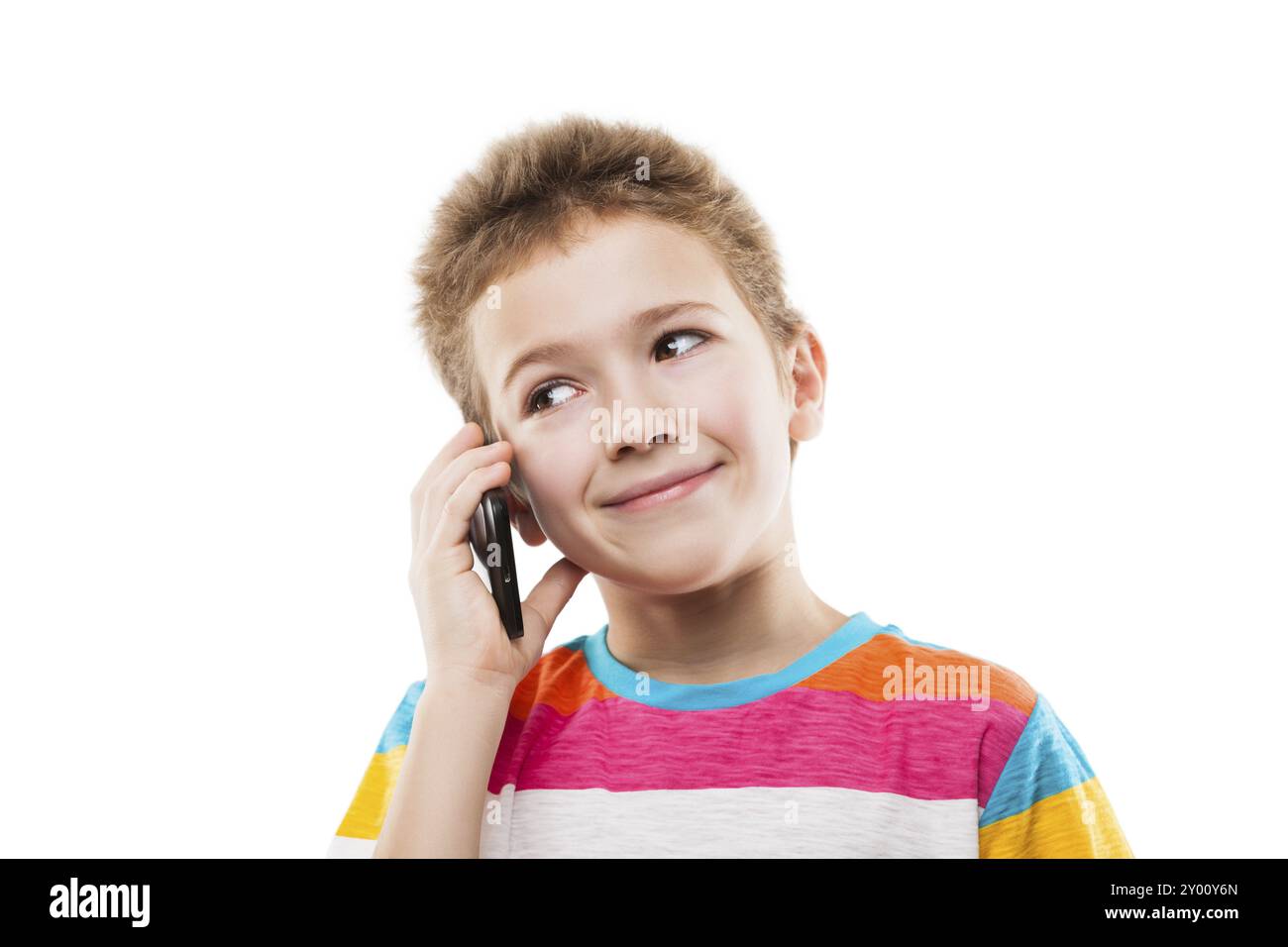 Beauty smiling child boy hand holding mobile phone or talking ...