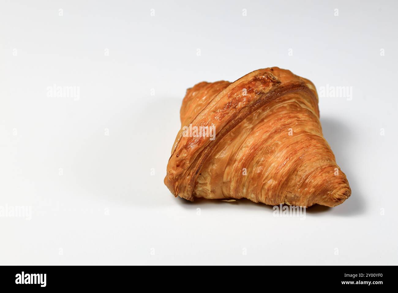 Freshly baked croissant, Brown crispy croissants isolated on white background. French pastry ...