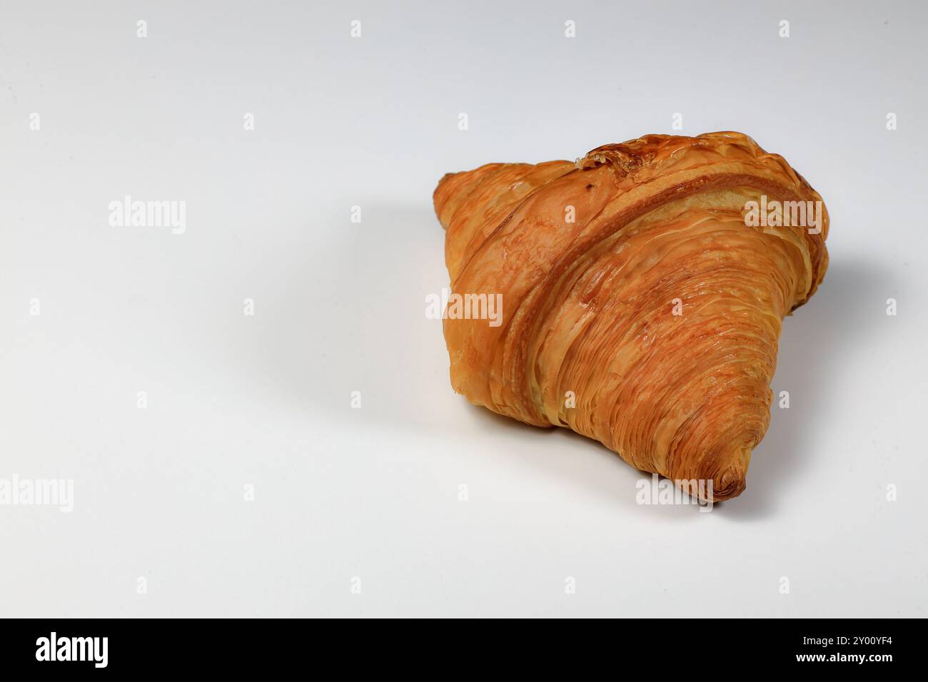 Freshly baked croissant, Brown crispy croissants isolated on white background. French pastry ...