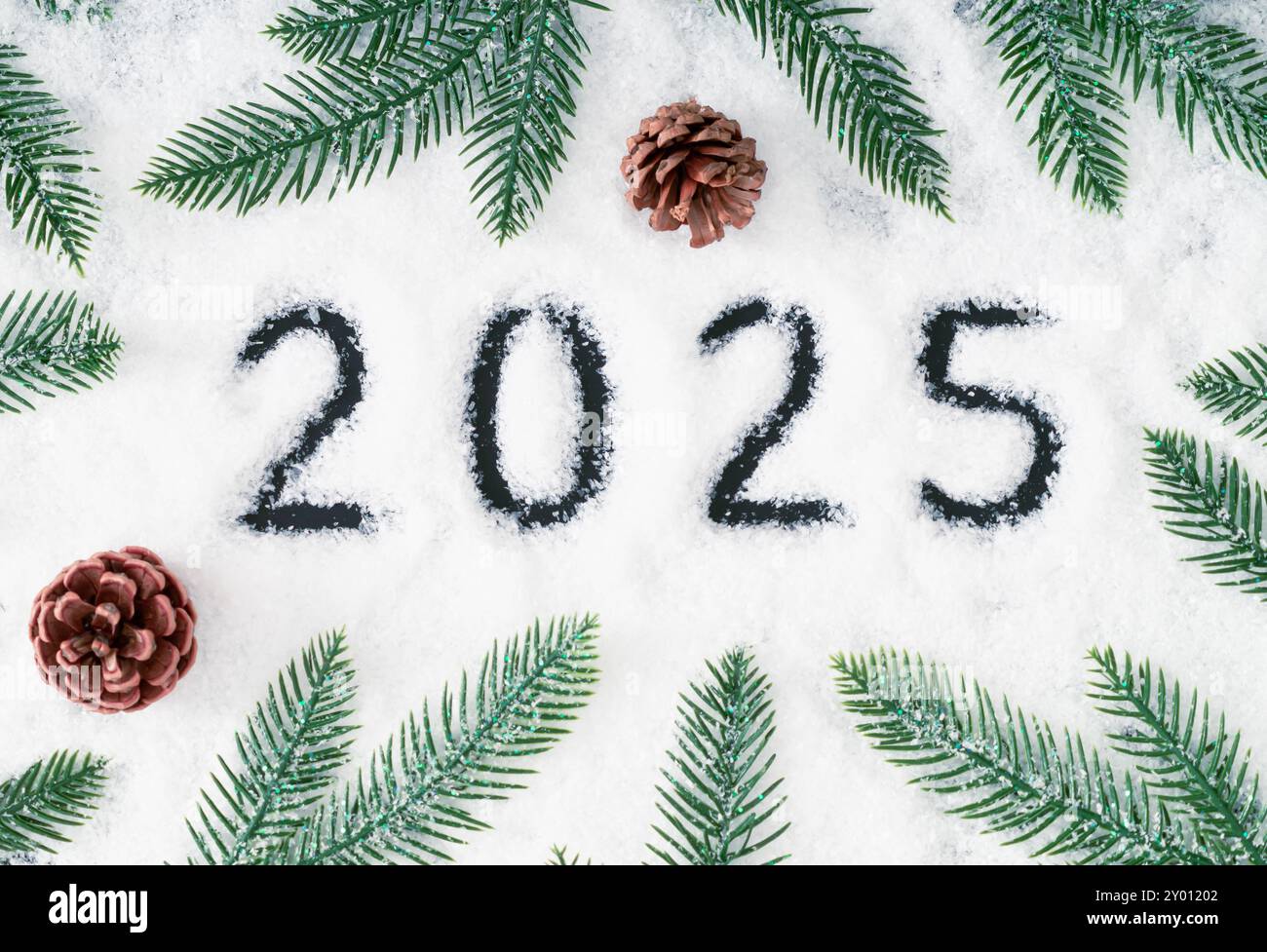 Trendy Christmas layout made with green snowy Xmas tree branches and ...