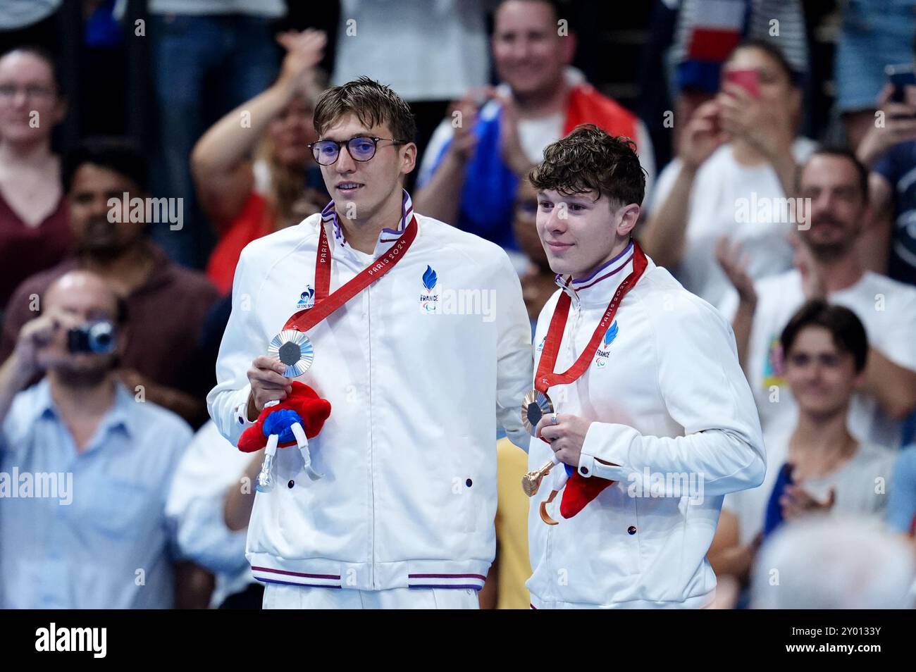 France's Alex Portal (left) on the podium with the silver medal ...