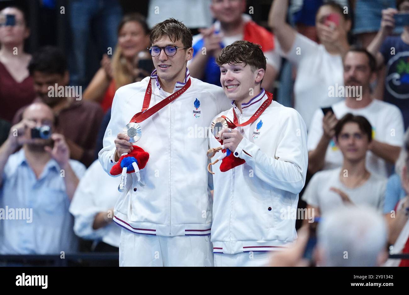 France's Alex Portal (left) on the podium with the silver medal ...