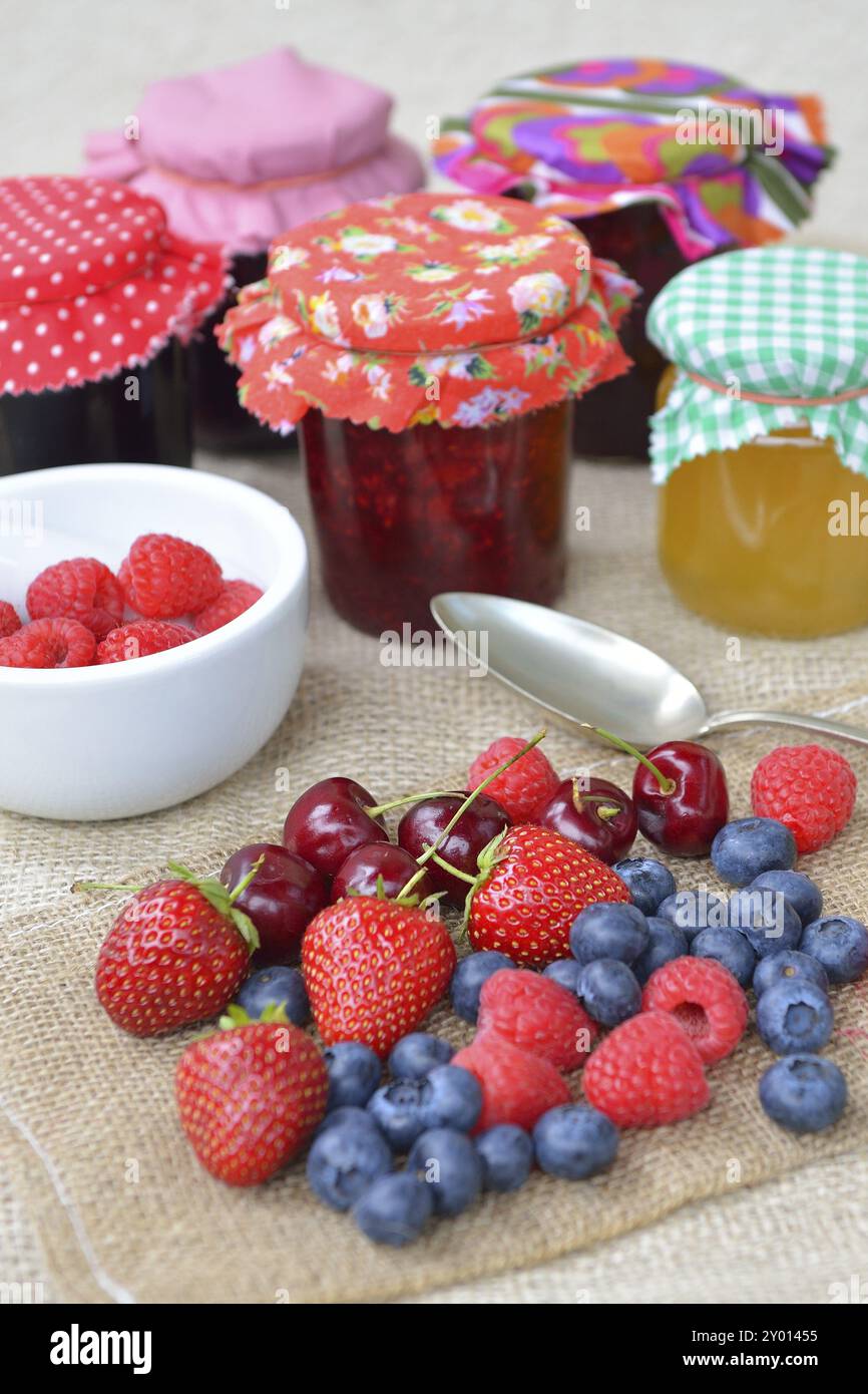 Jam boil from fresh fruits. Different types of jam Stock Photo - Alamy