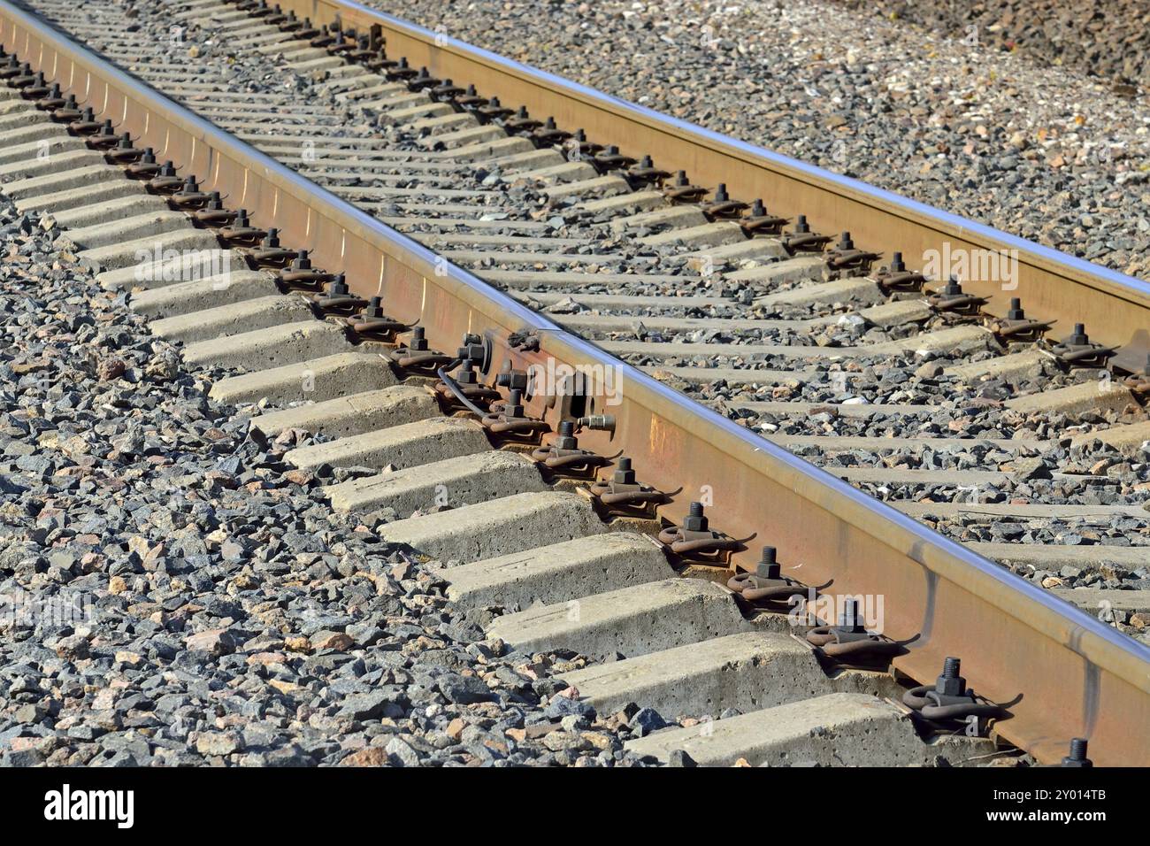 Arrow Rails. Rail and concrete sleepers closeup Stock Photo - Alamy