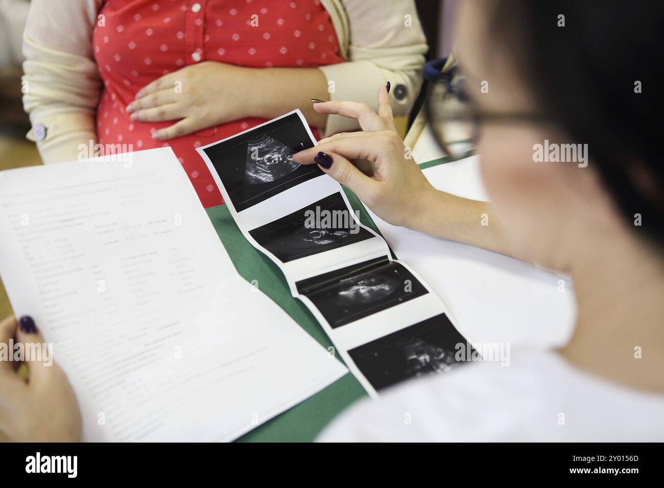 Young pregnant woman check up at doctors office Stock Photo - Alamy