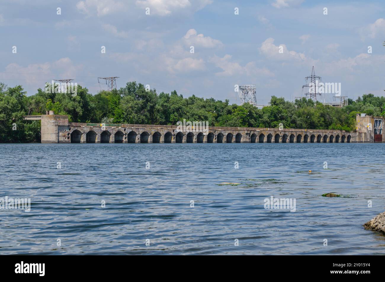 bridge hydroelectric plant on blue sky background Stock Photo - Alamy