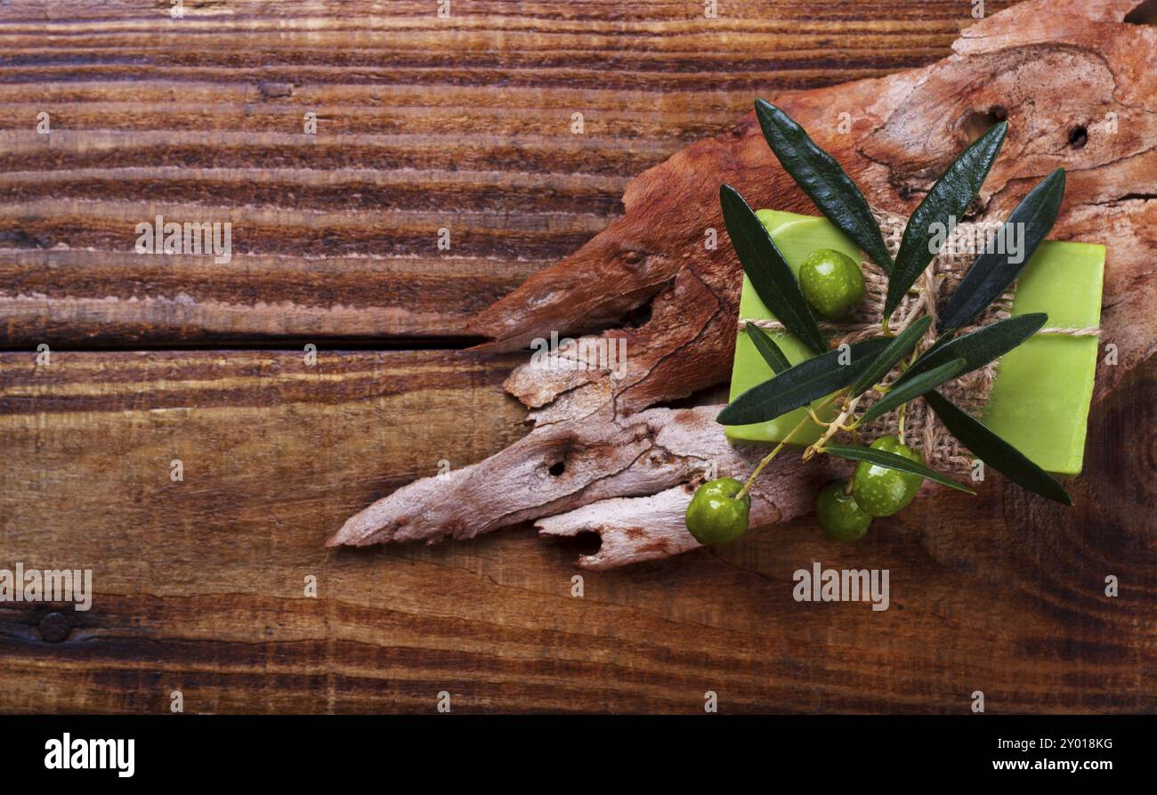 Handmade greek olive soap on rustic wooden background Stock Photo - Alamy
