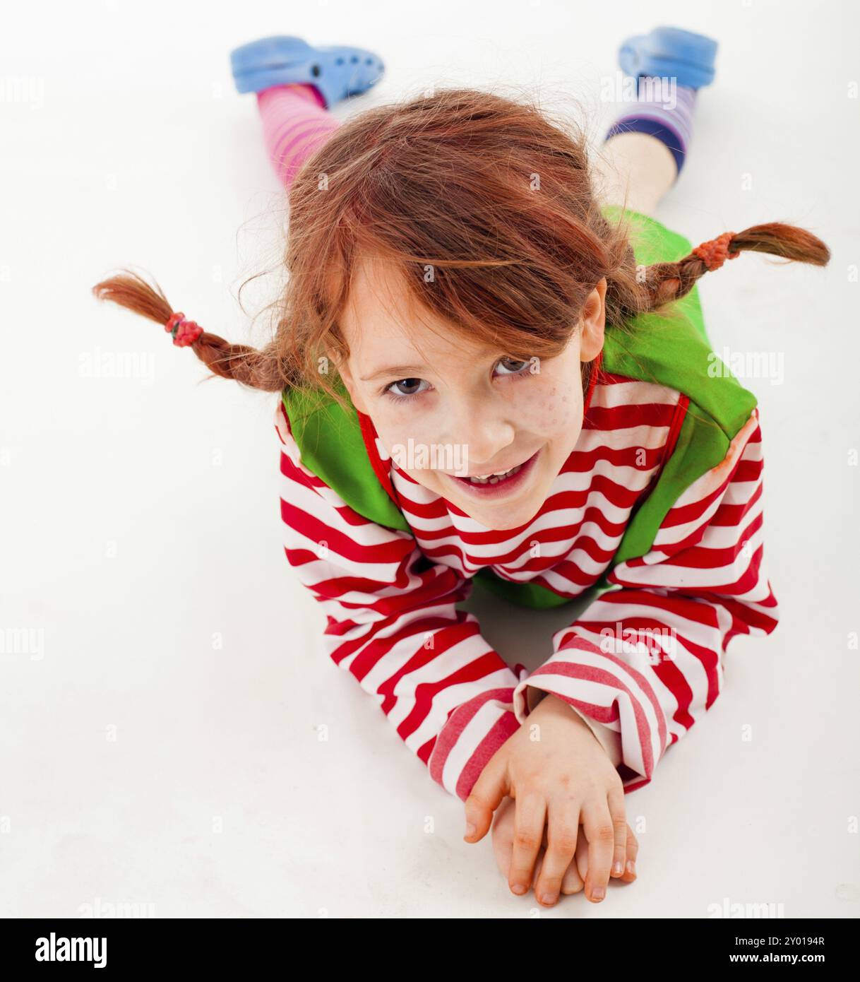 Little girl dressed as Pippi Longstocking with white background Stock ...