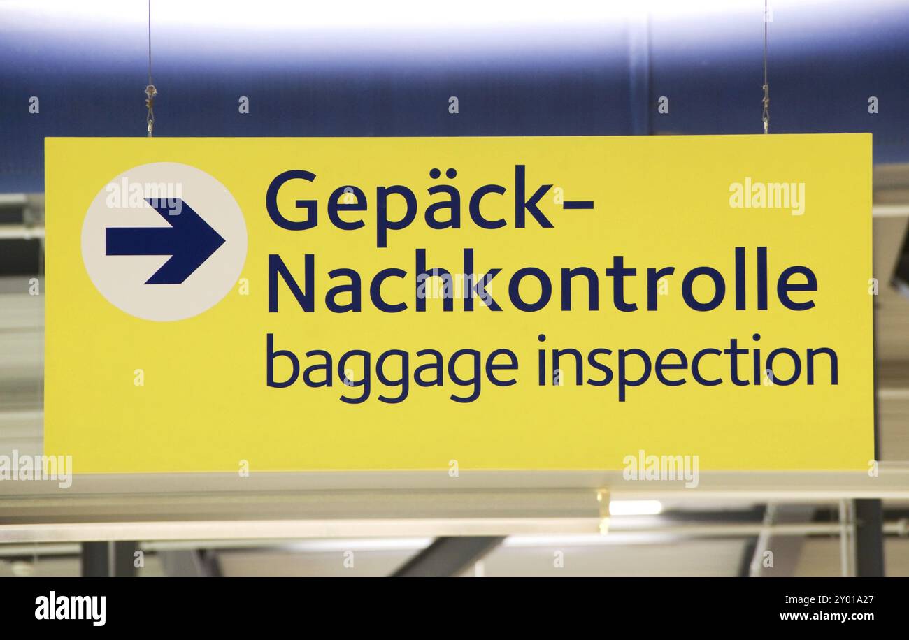 German sign with text baggage inspection at the customs Stock Photo - Alamy