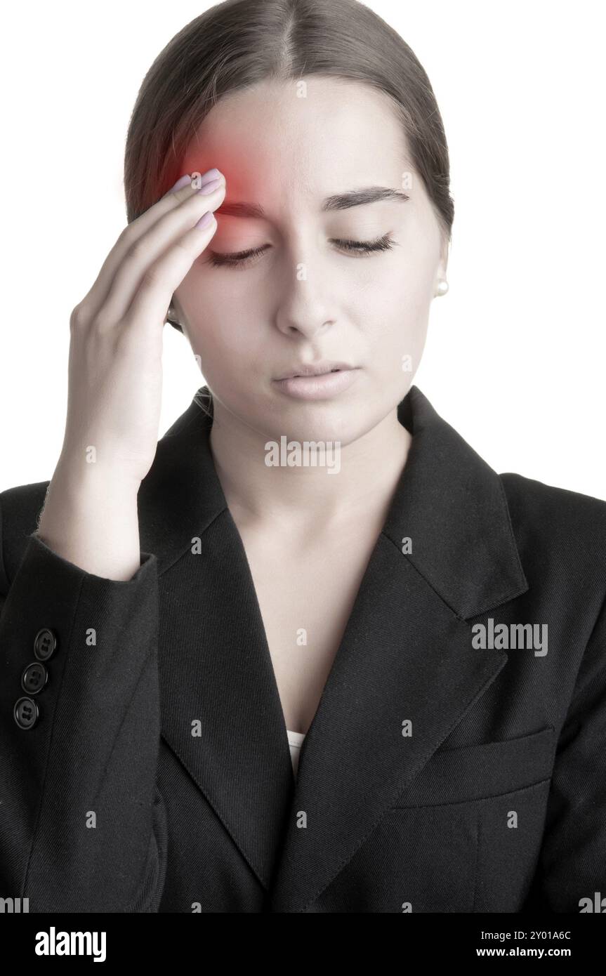 Business woman suffering from an headache, holding her hand to the head ...