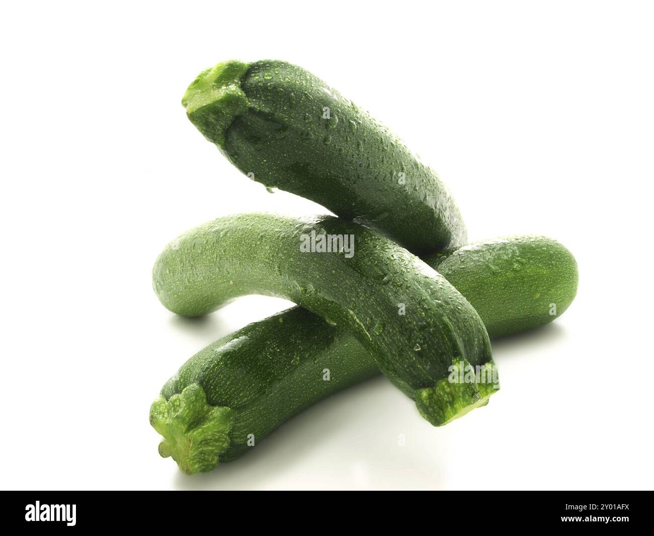 Whole zucchini vegetable isolated towards white background Stock Photo ...