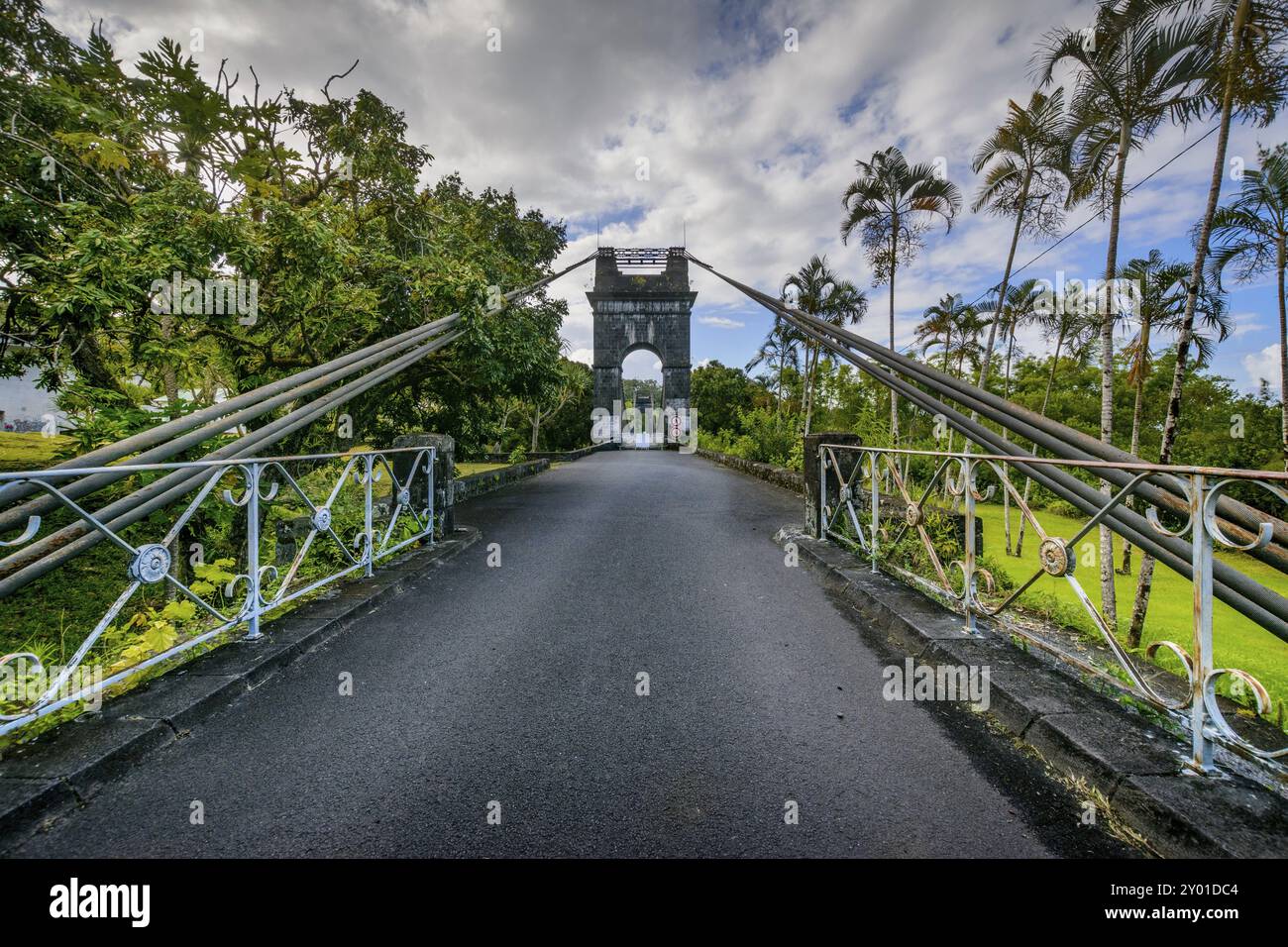 Old suspended bridge at Sainte Rose during a cloudy day, Reunion Island ...