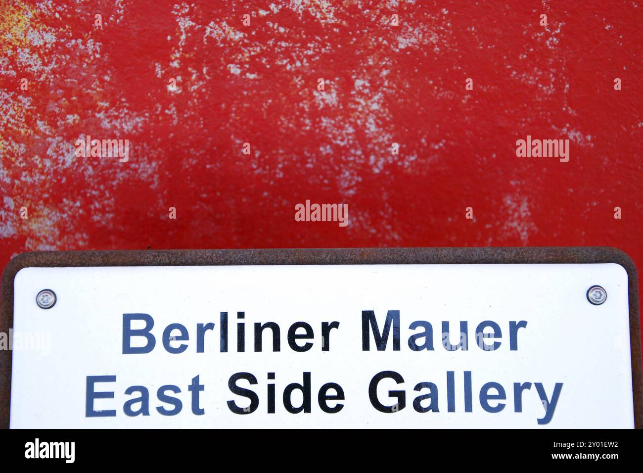 Berlin wall and sign of east side gallery with red paint Stock Photo ...