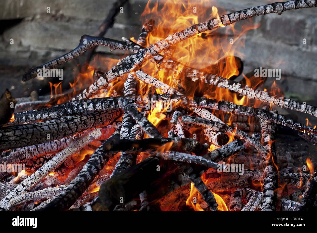 Big fire on fireplace outdoor Stock Photo - Alamy