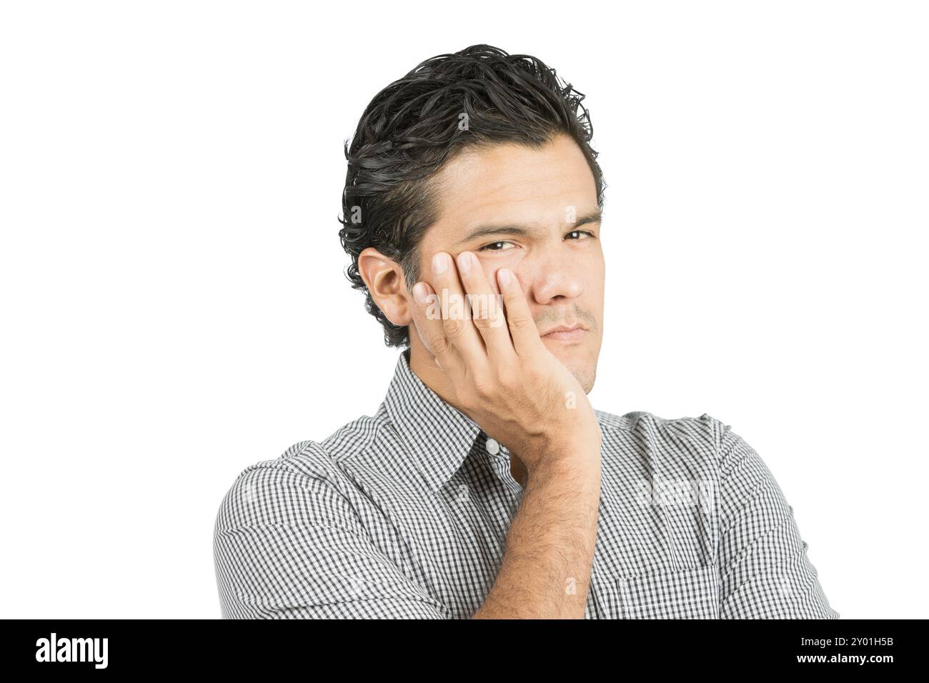Portrait of concerned, worried hispanic male in casual clothes cupping ...