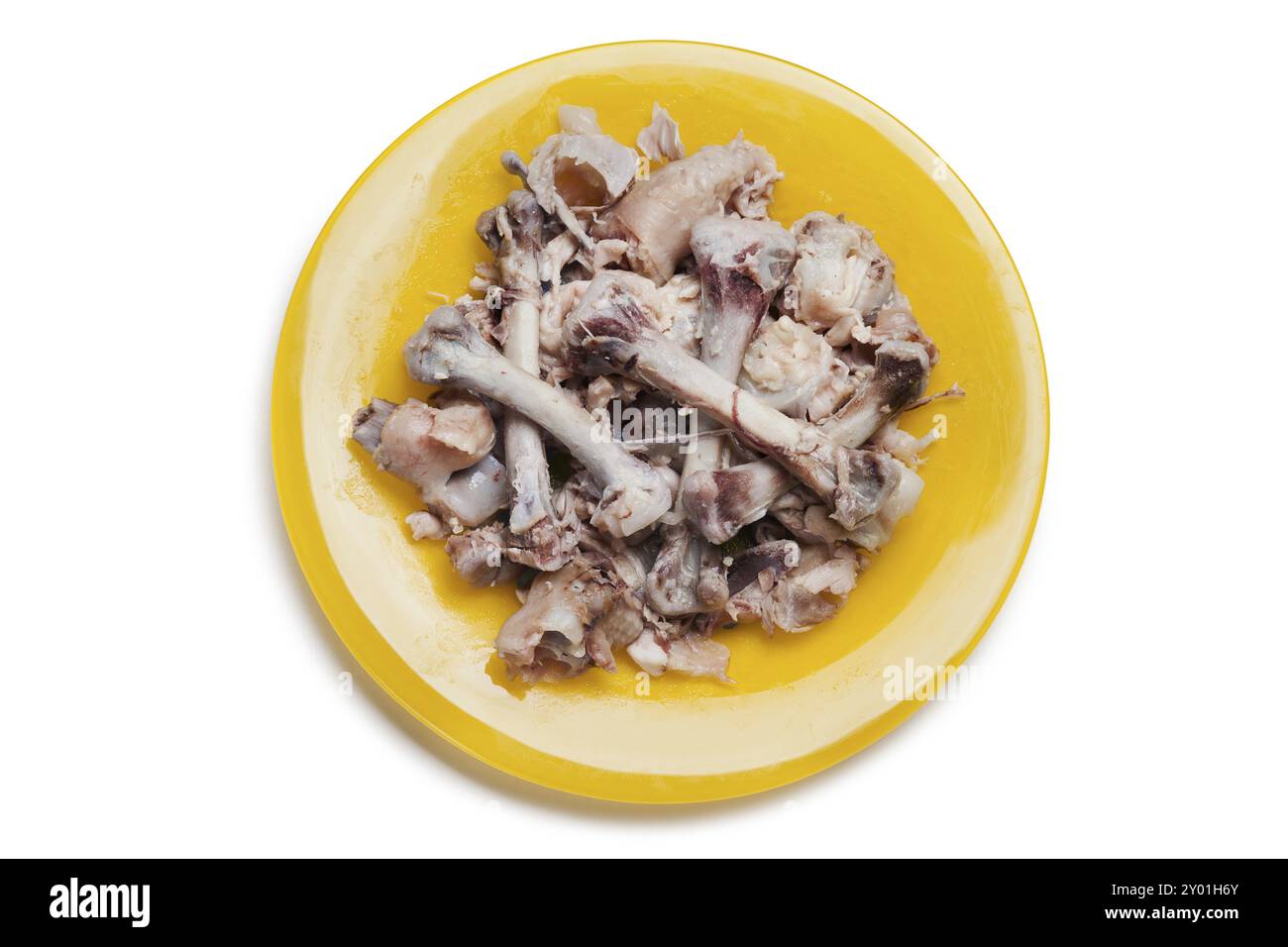 Food leftovers, chicken meat bones heap on plate white isolated Stock ...