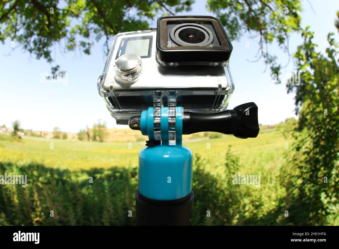 Modern action camera with monopod outdoors. Fisheye lens effect Stock ...